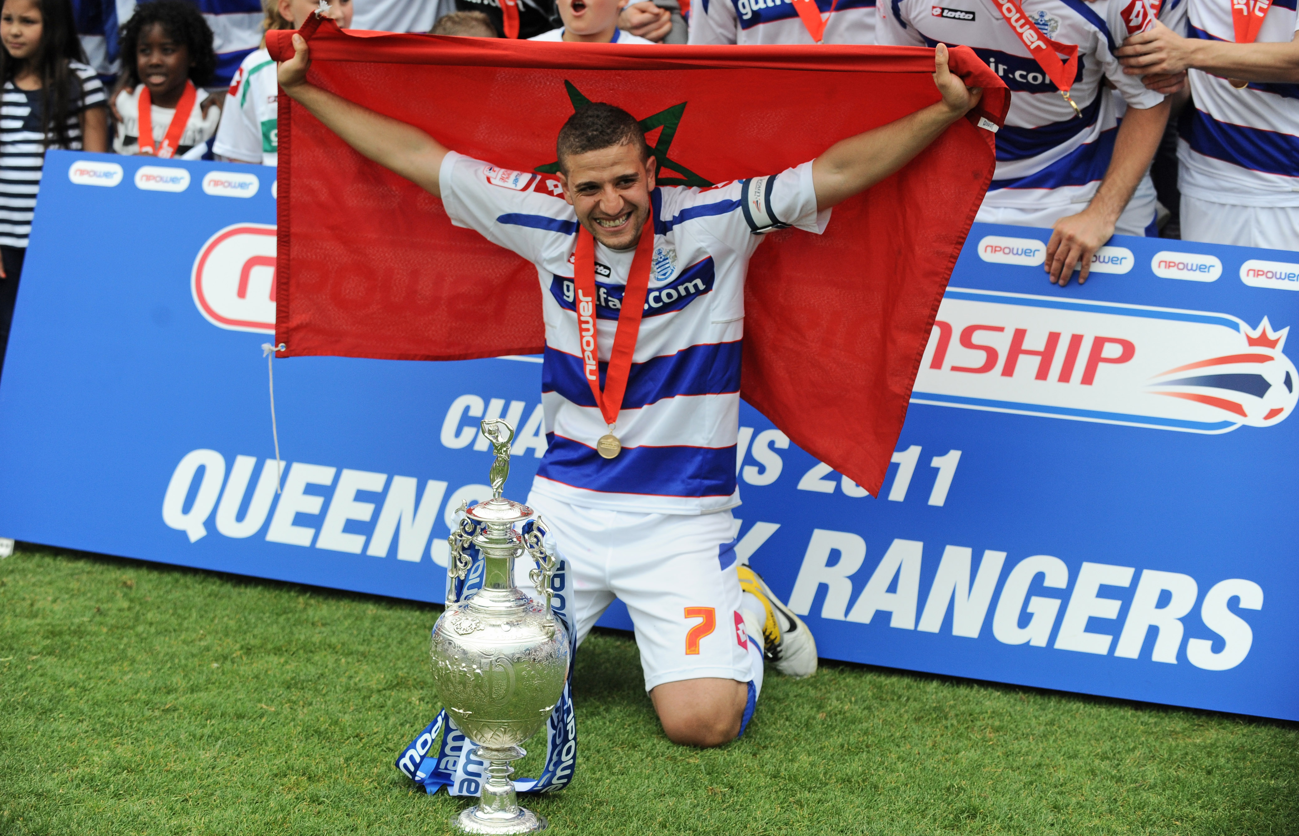 Adel Taarabt of QPR with the NPower Championship trophy and a Moroccan ...